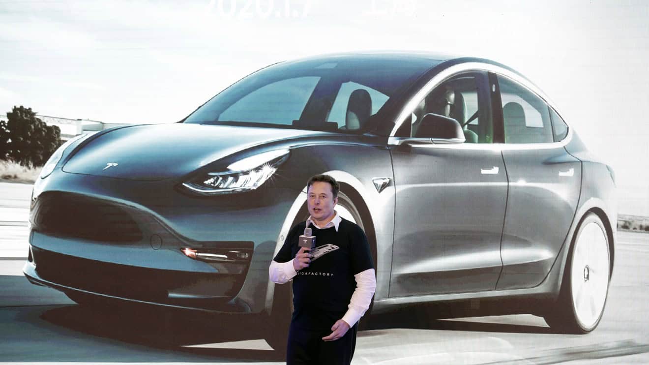 Tesla stock tops $900, closes at record - Equity Insider