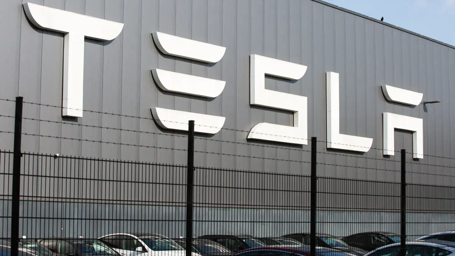 Tesla says it made its first driverless delivery of a new car to a ...